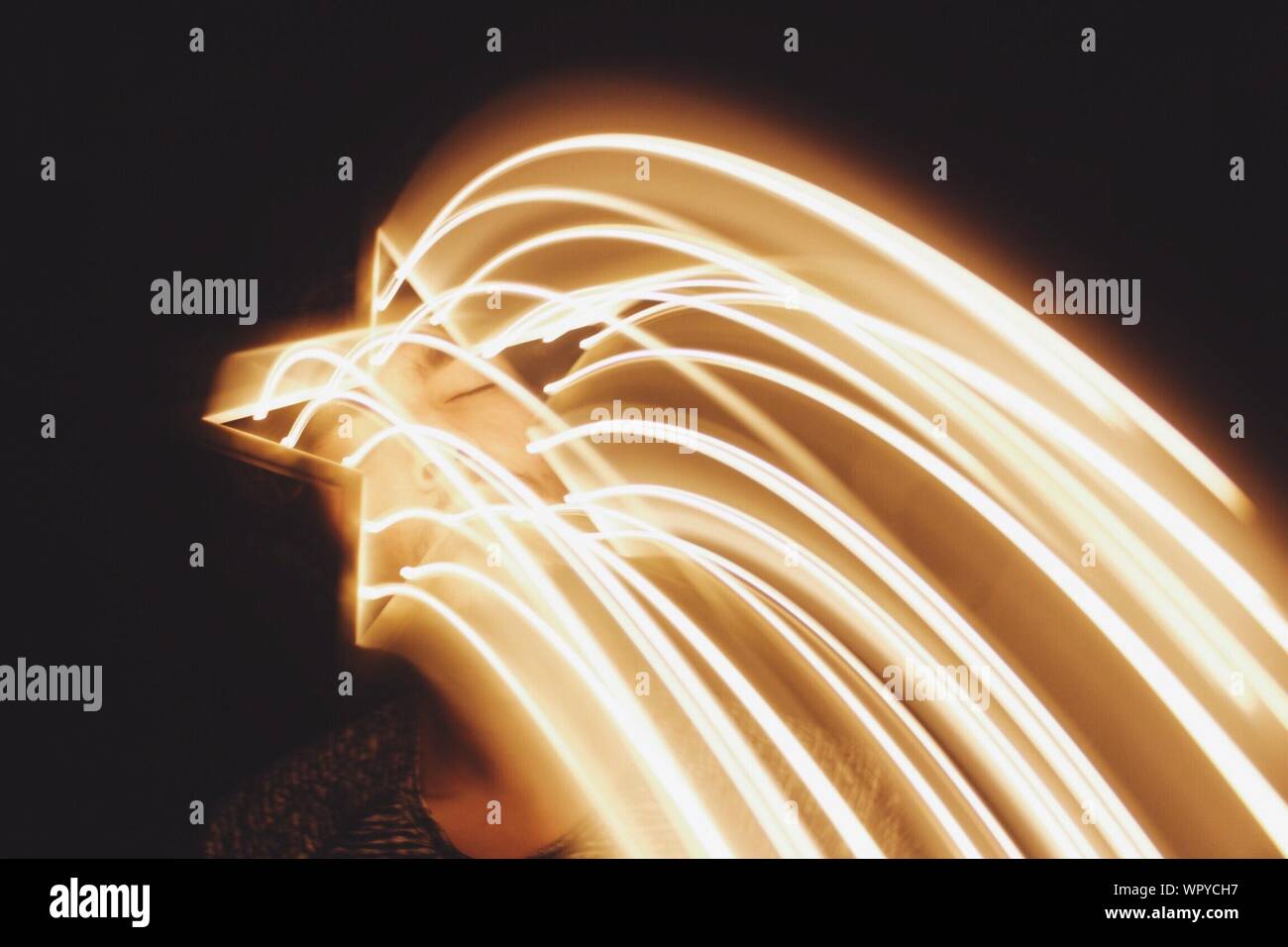 Face young man glowing light hi-res stock photography and images - Alamy