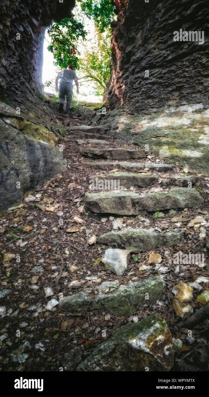 Old man walking down steps hi-res stock photography and images - Alamy