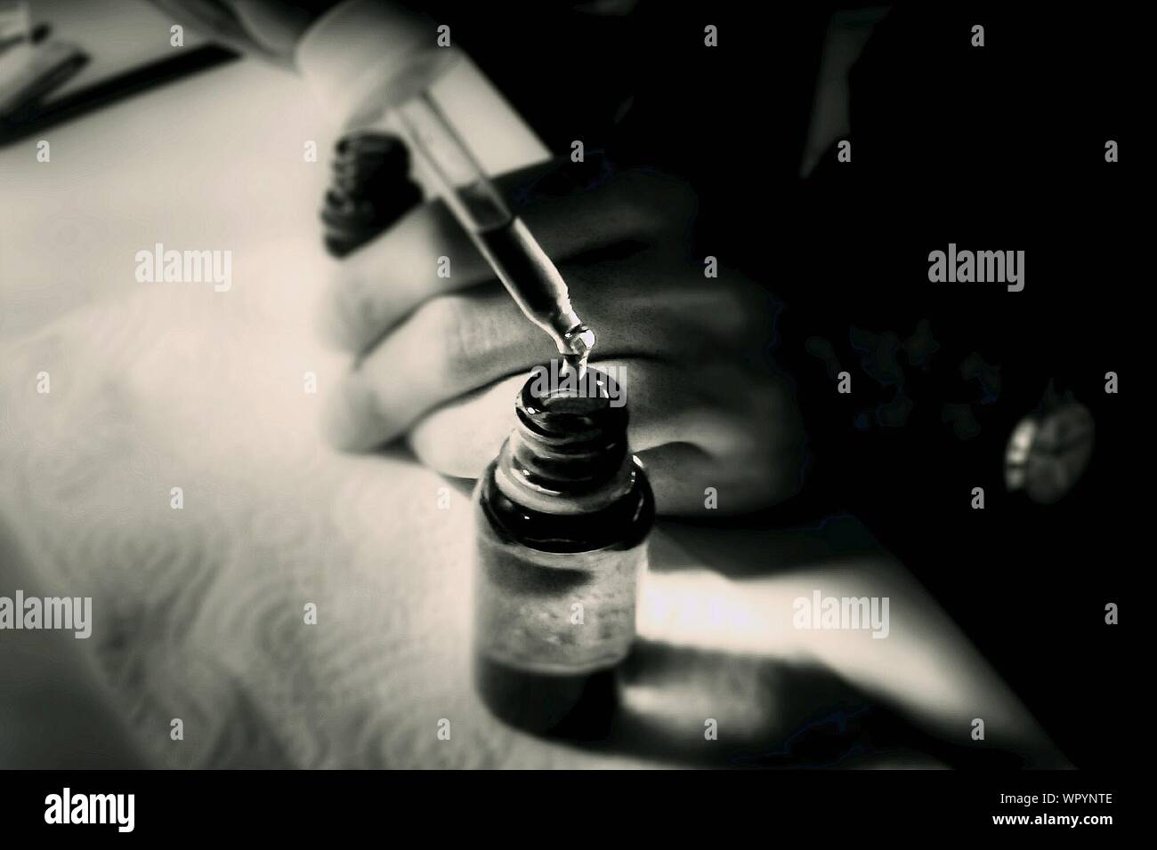 Pouring chemical hi-res stock photography and images - Alamy