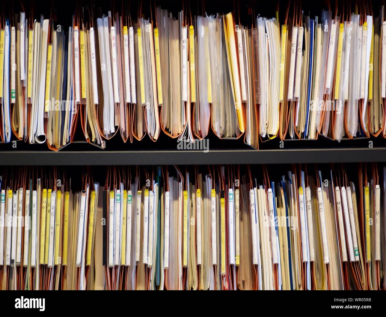 Folders on shelf hi-res stock photography and images - Alamy