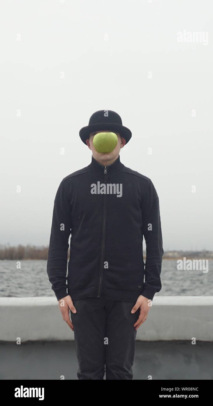 Man apple in front face hi-res stock photography and images - Alamy