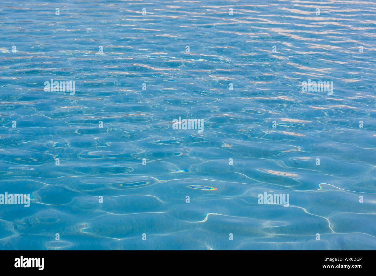 Blue swimming pool water surface texture background Stock Photo - Alamy