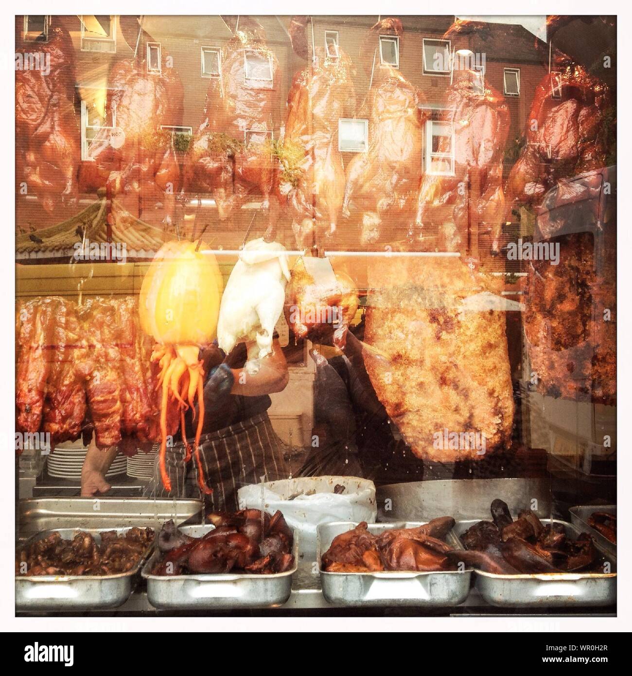 Hanging meats hi-res stock photography and images - Alamy