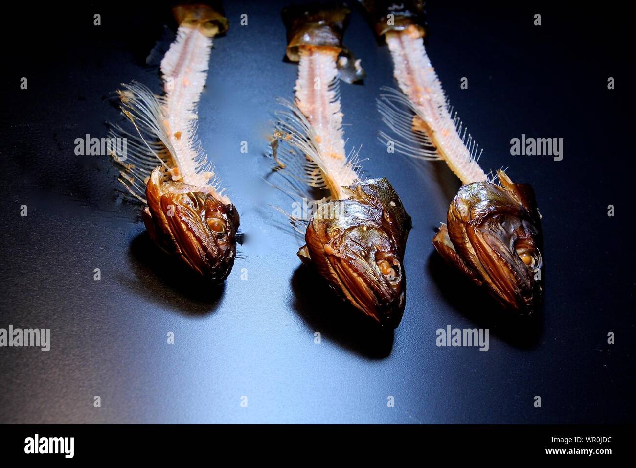 Eating fish bones hi-res stock photography and images - Alamy