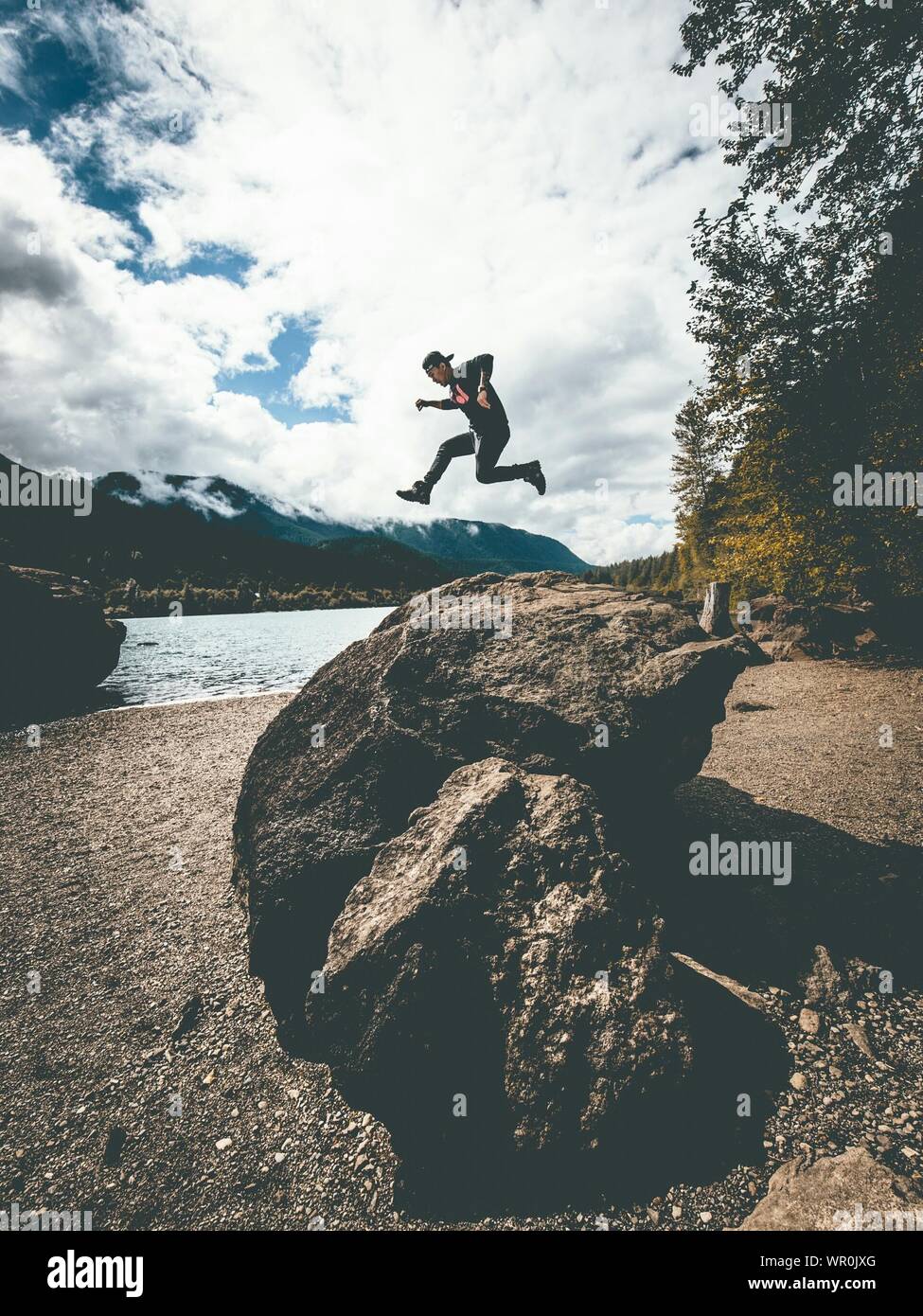 Jumping stone hi-res stock photography and images - Alamy