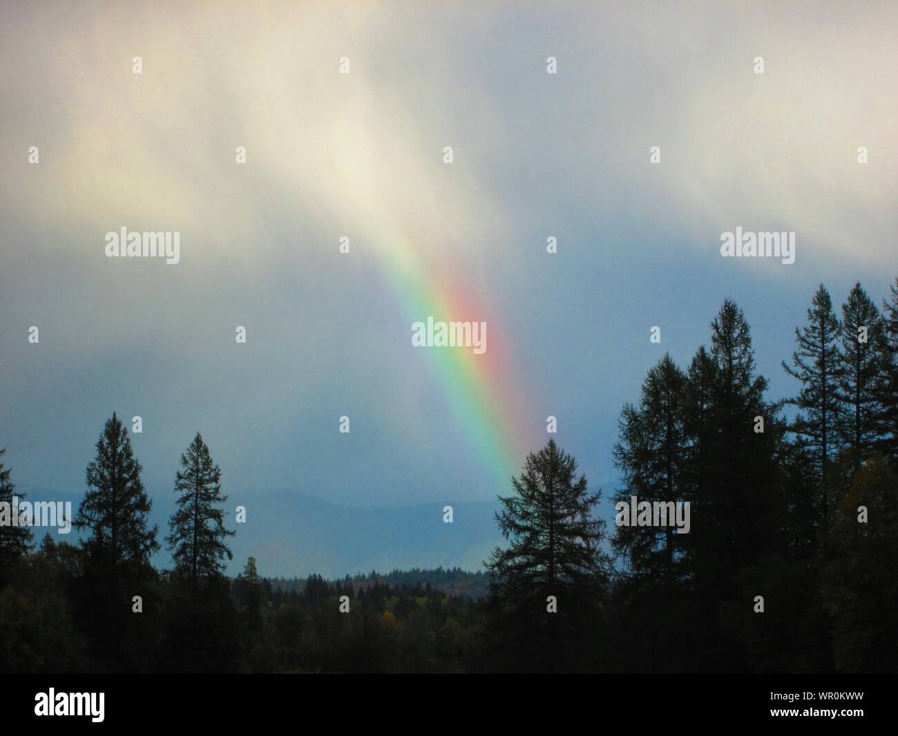 Rainbow into countryside hi-res stock photography and images - Alamy