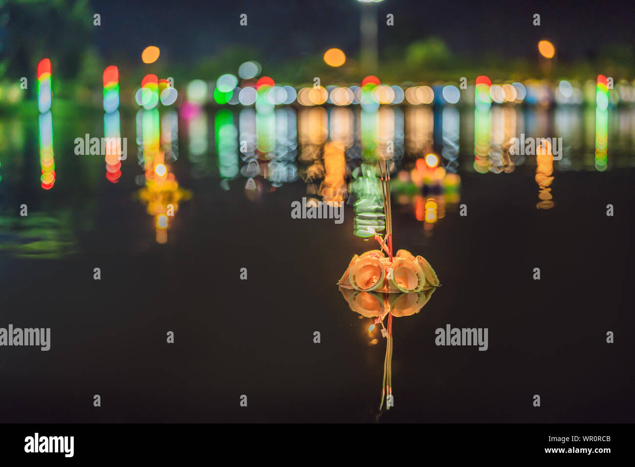 Loy Krathong festival, People buy flowers and candle to light and float ...