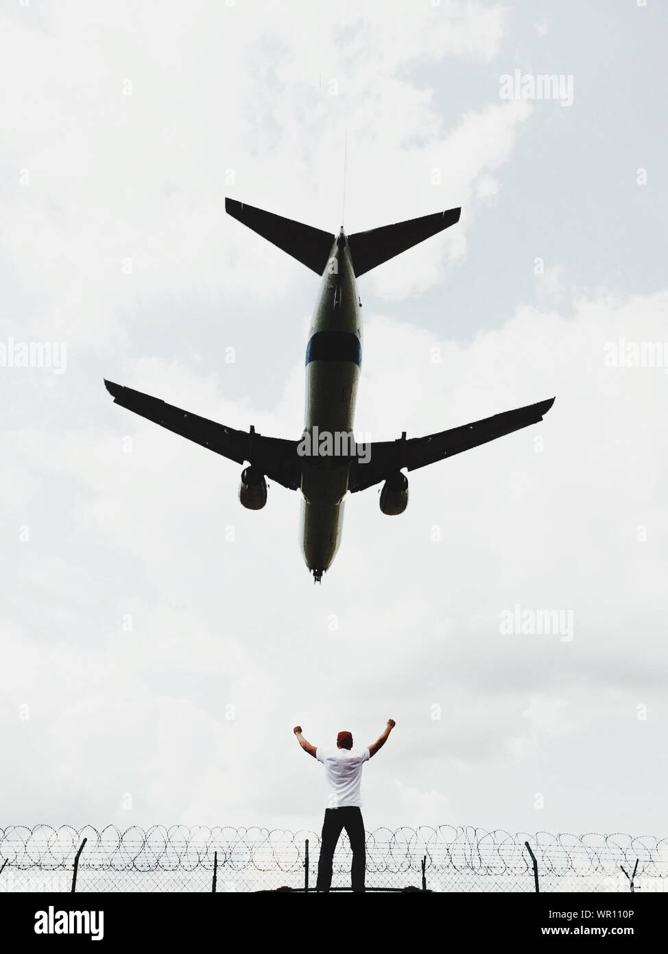 Airplane arms hi-res stock photography and images - Alamy