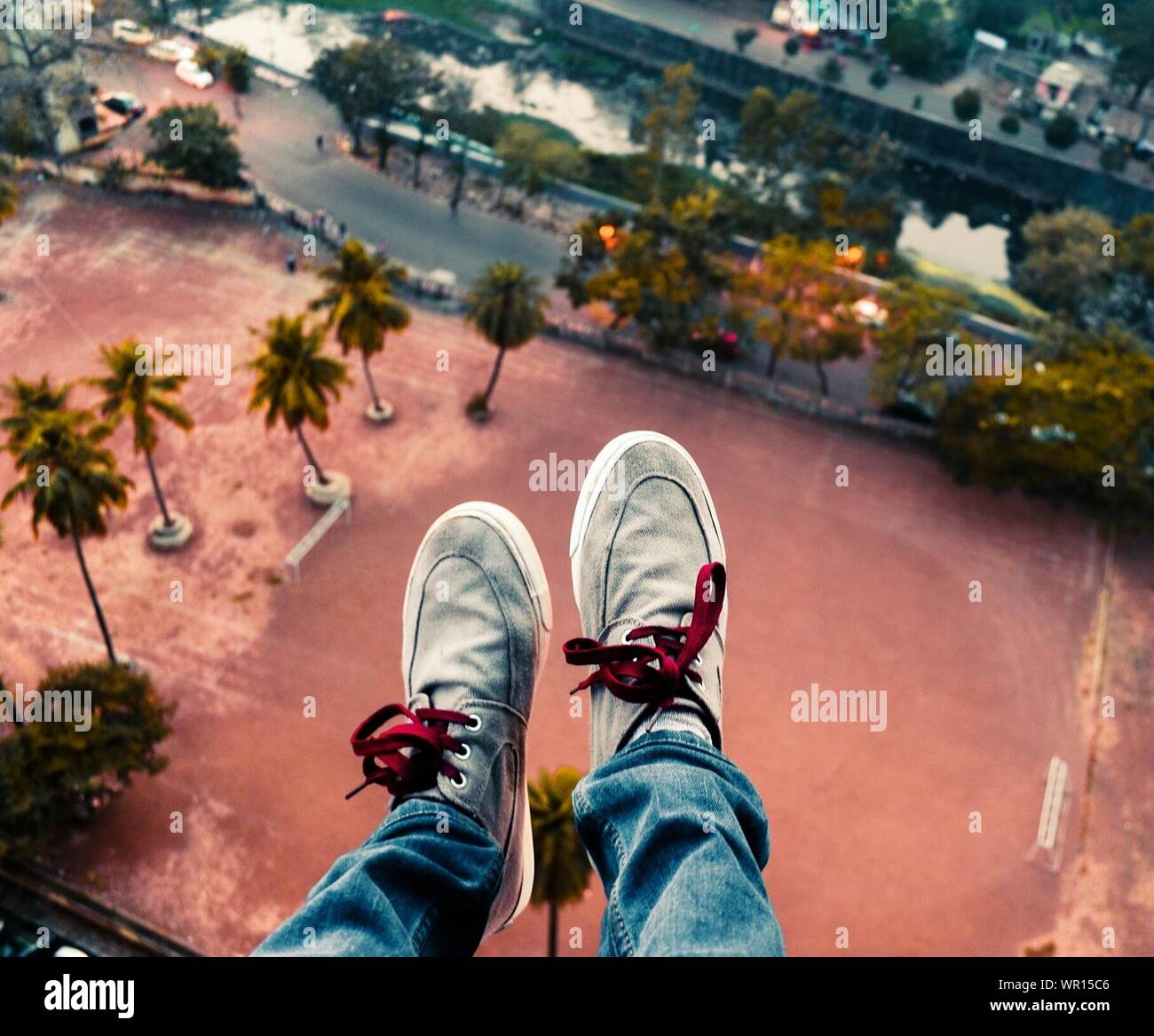Man sitting on rooftop hi-res stock photography and images - Alamy