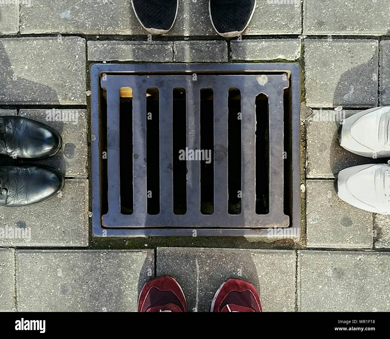 Standing around hi-res stock photography and images - Alamy