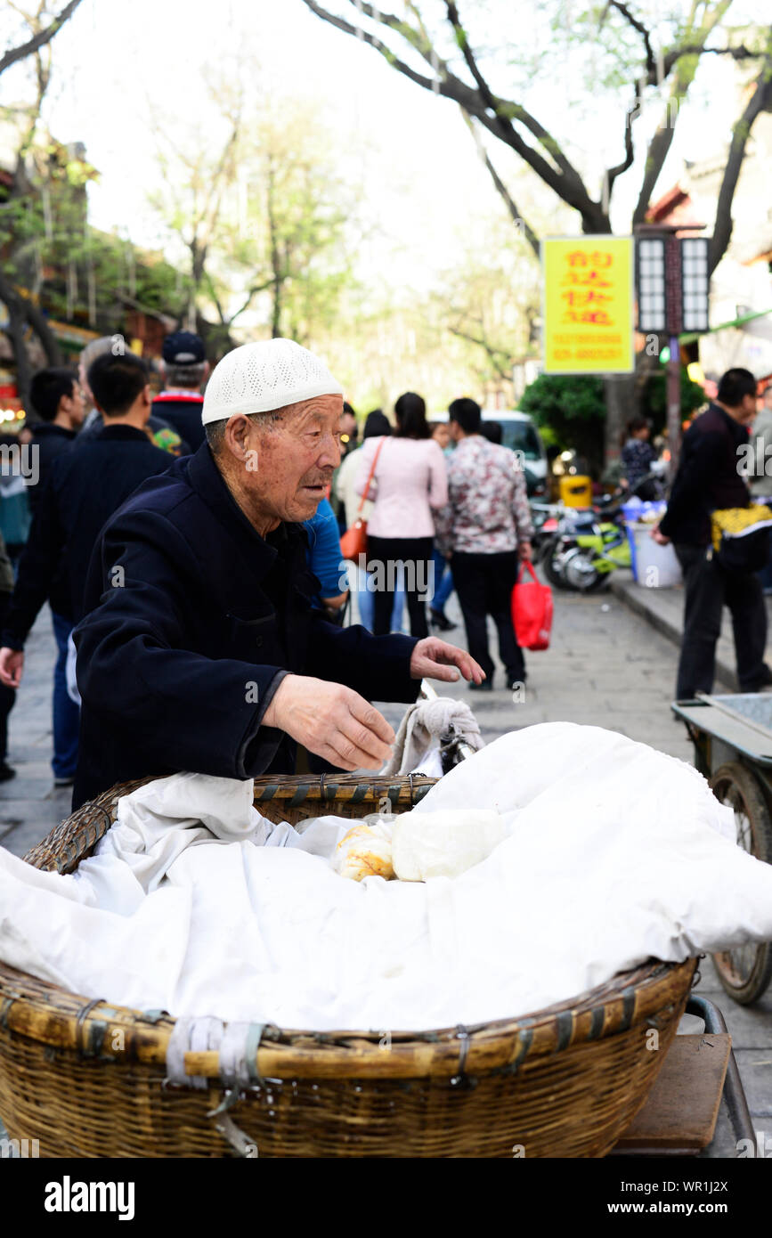 A Muslim vendor in Xi'an, China Stock Photo - Alamy