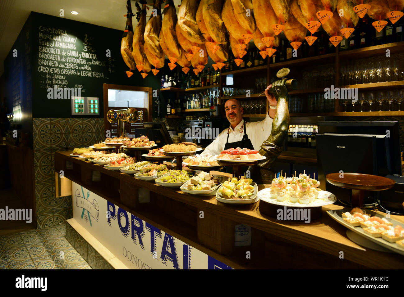 Spain bar food bartender hi-res stock photography and images - Alamy