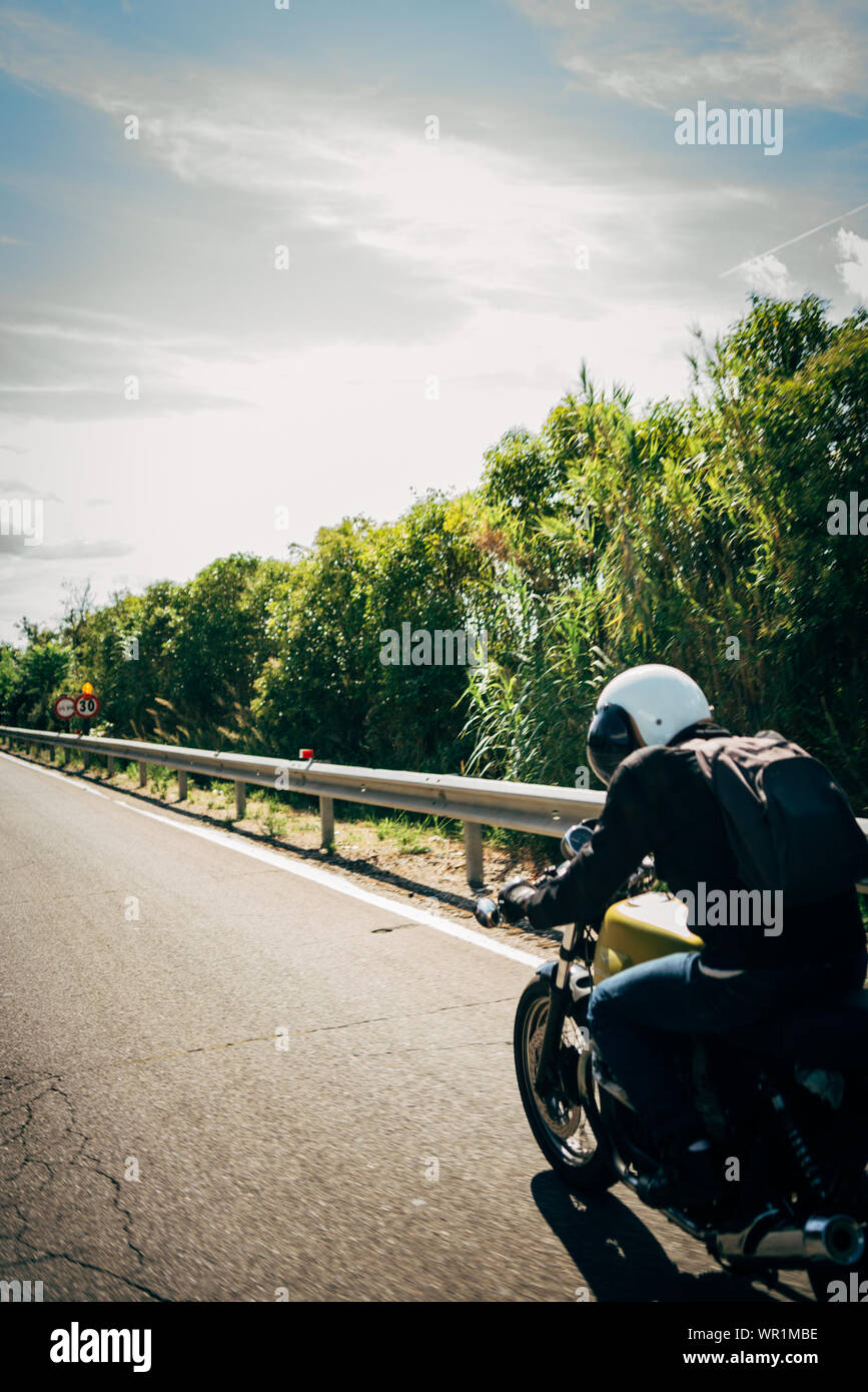 Man and motorcycle helmet and rear view hi-res stock photography and ...