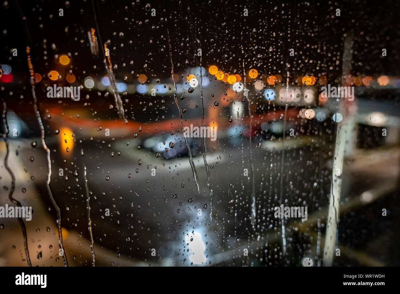 Raindrops on a window glass Stock Photo - Alamy