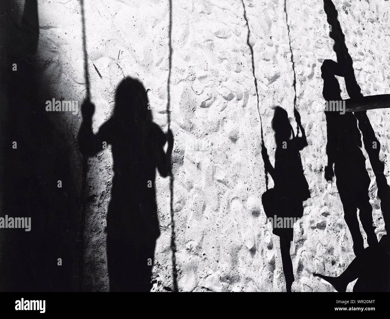 Children on swings hi-res stock photography and images - Alamy