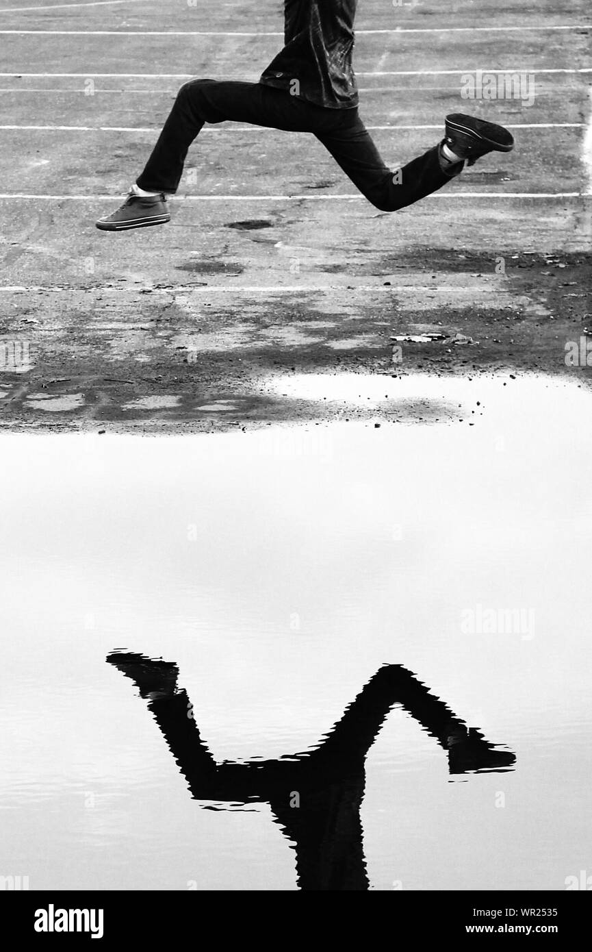 Man Jumping In Puddle High Resolution Stock Photography and Images - Alamy