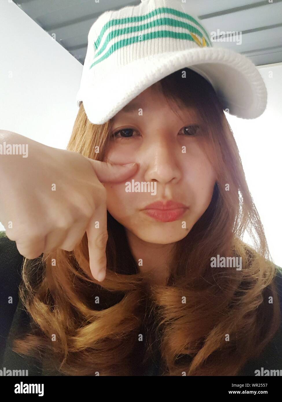 Hand face woman hi-res stock photography and images - Alamy