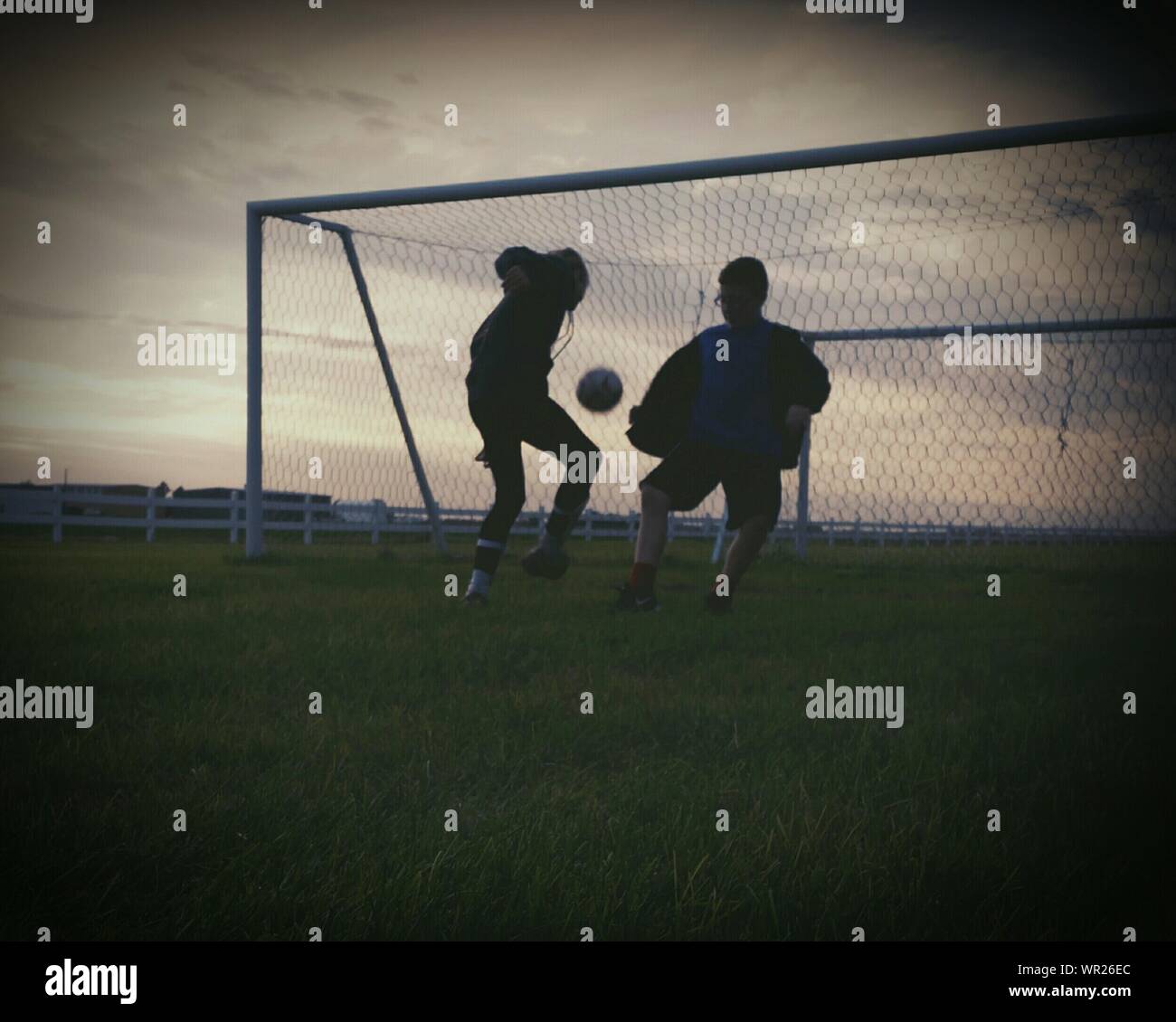 Girls and boys playing soccer hi-res stock photography and images - Alamy