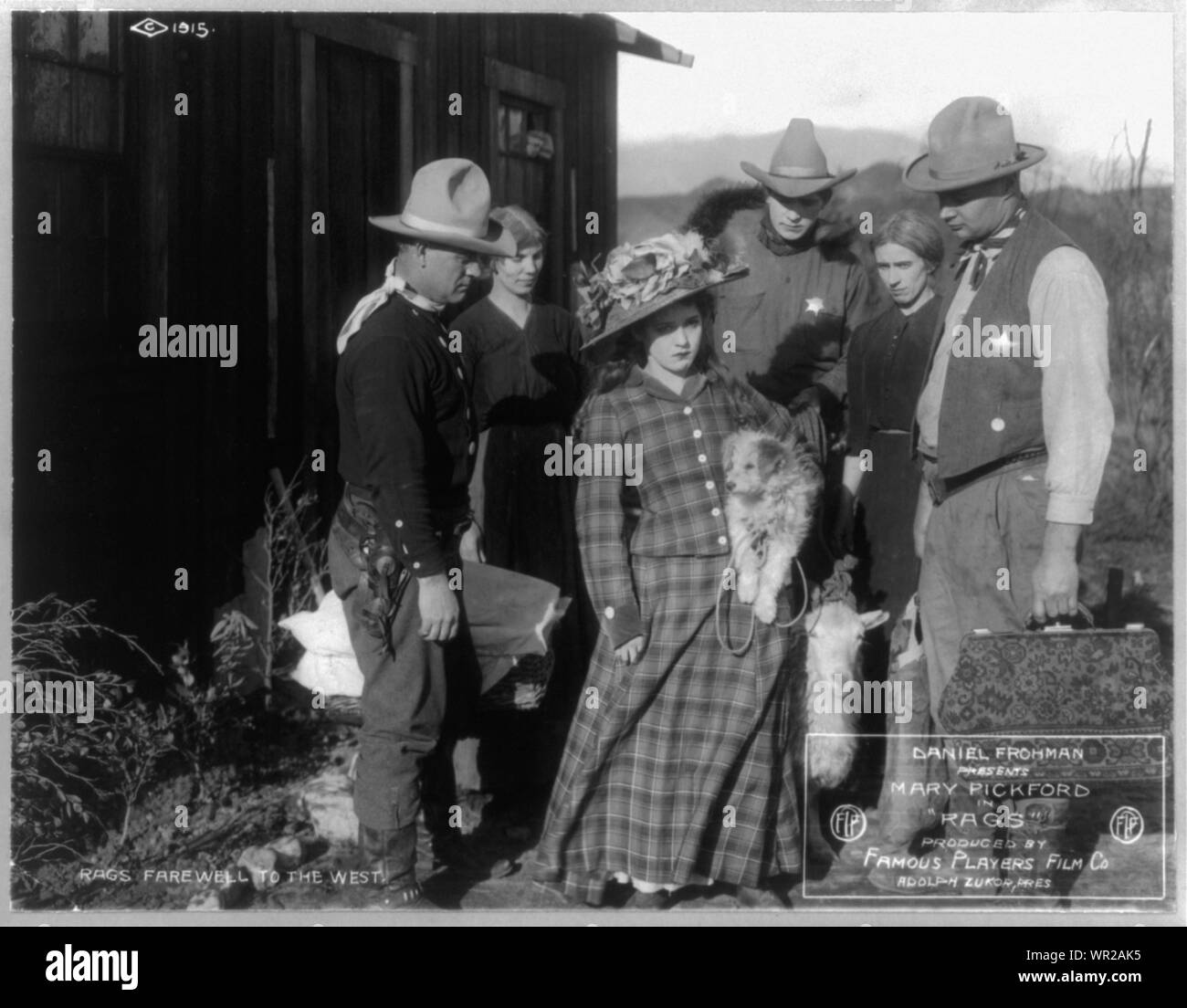 Mary Pickford, 1893-, full length portrait, standing, facing right, in ...