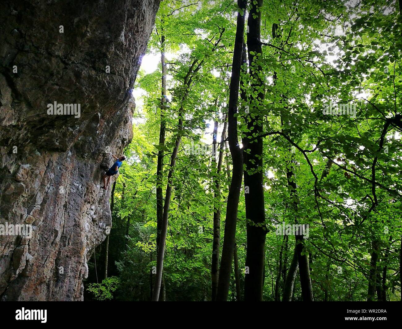 Climbing cliff face hi-res stock photography and images - Alamy