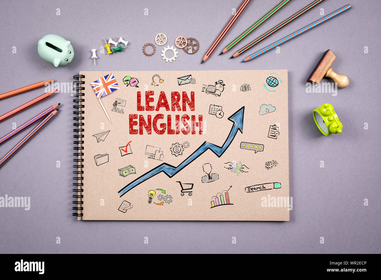 Learn English concept. Notepad on gray table Stock Photo - Alamy