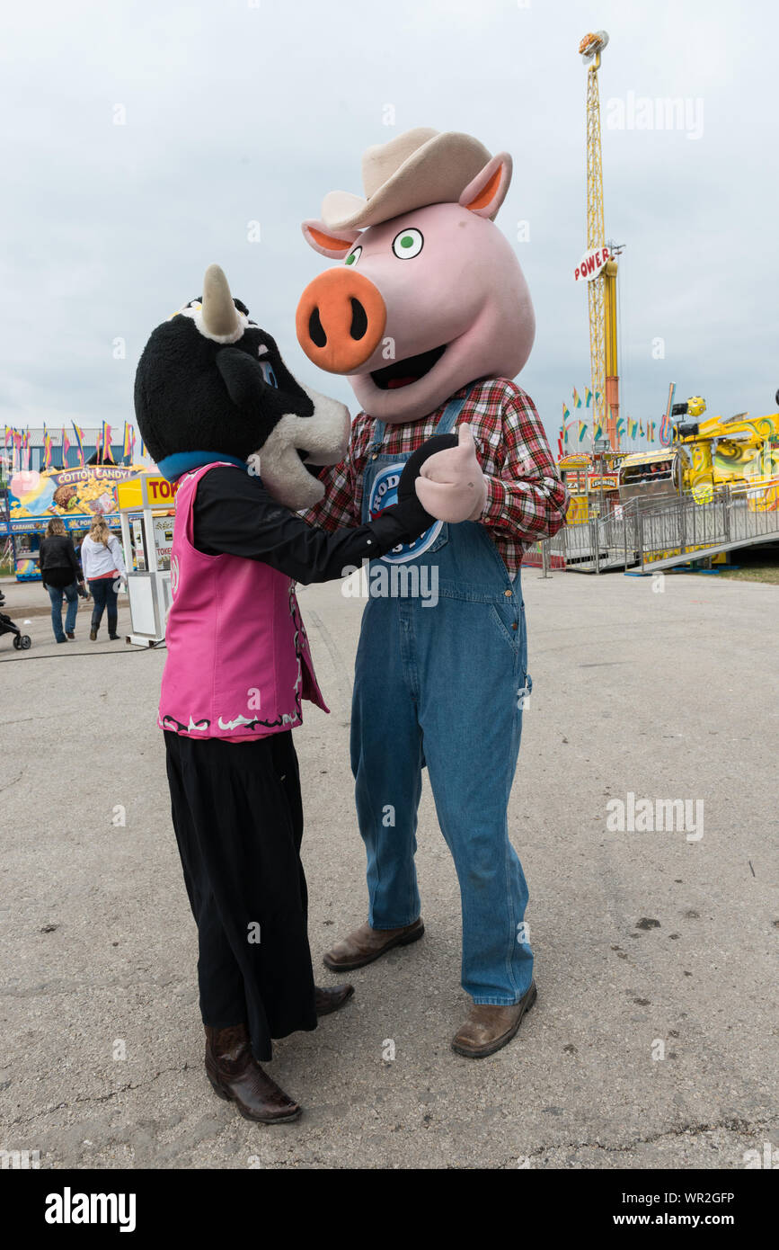 Mascots ham it up at the Star of Texas Fair and Rodeo, produced by ...