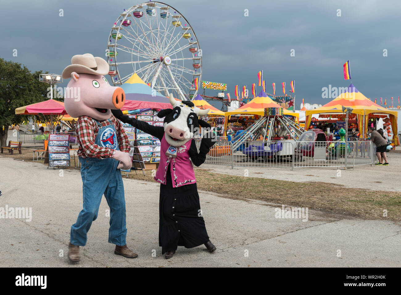 Mascots ham it up at the Star of Texas Fair and Rodeo, produced by ...
