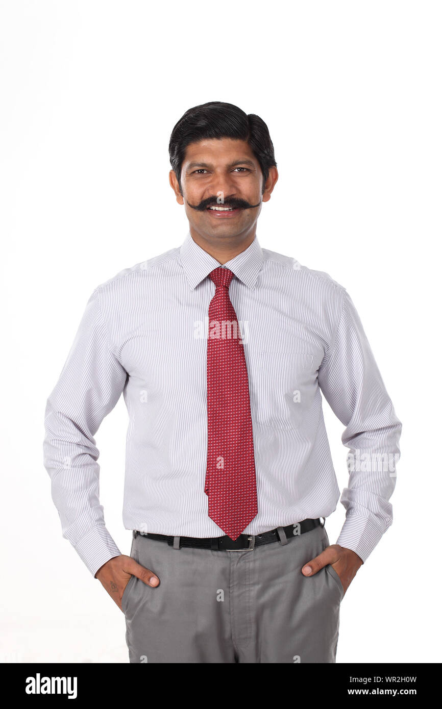 Standing smiling portrait happiness hands in pockets hi-res stock ...