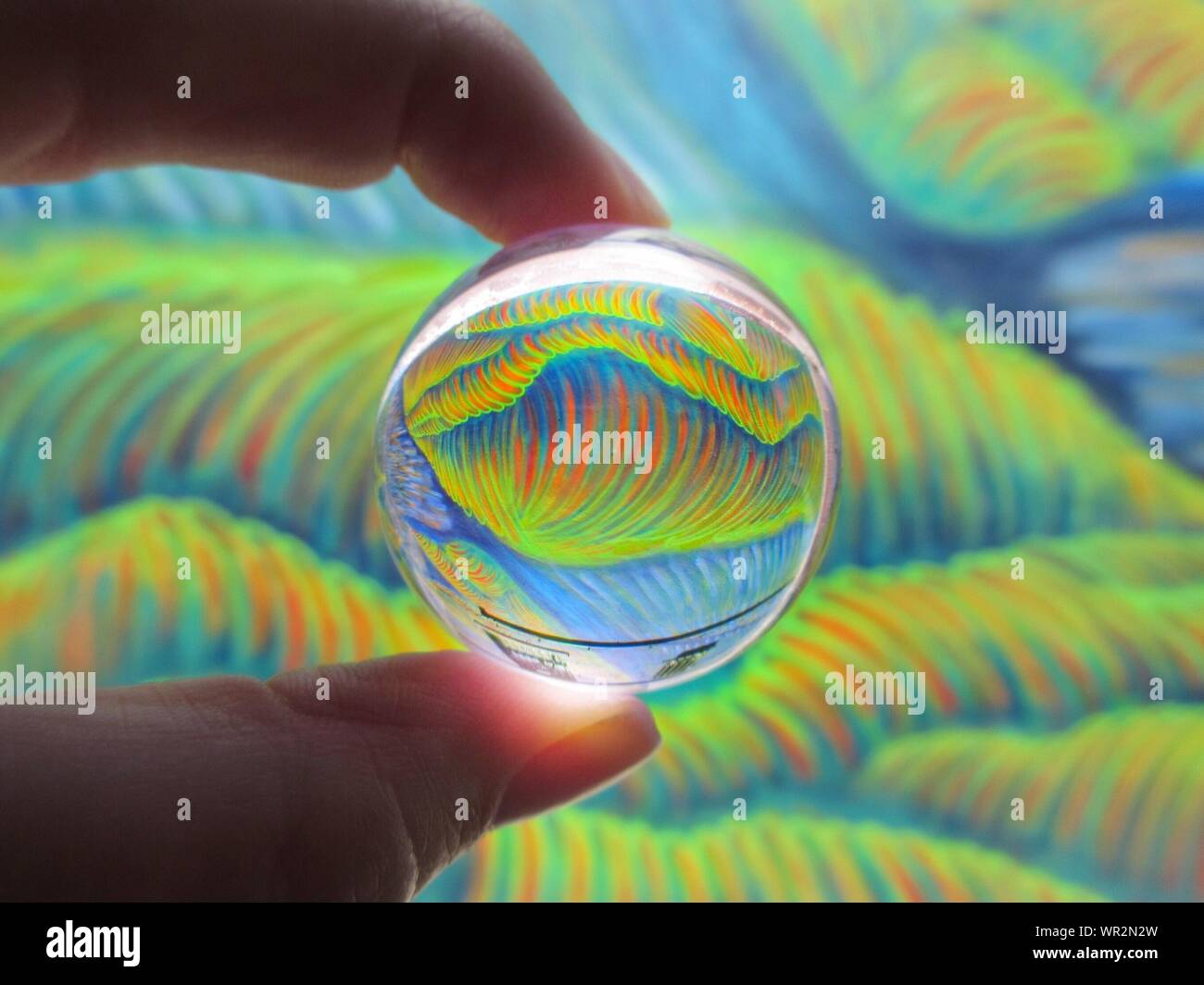 Hand Holding Glass Marble High Resolution Stock Photography and Images ...