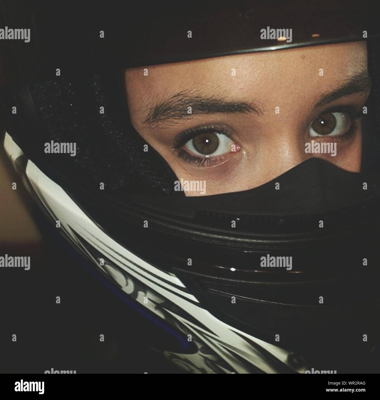 Young woman in motorcycle helmet hi-res stock photography and images ...