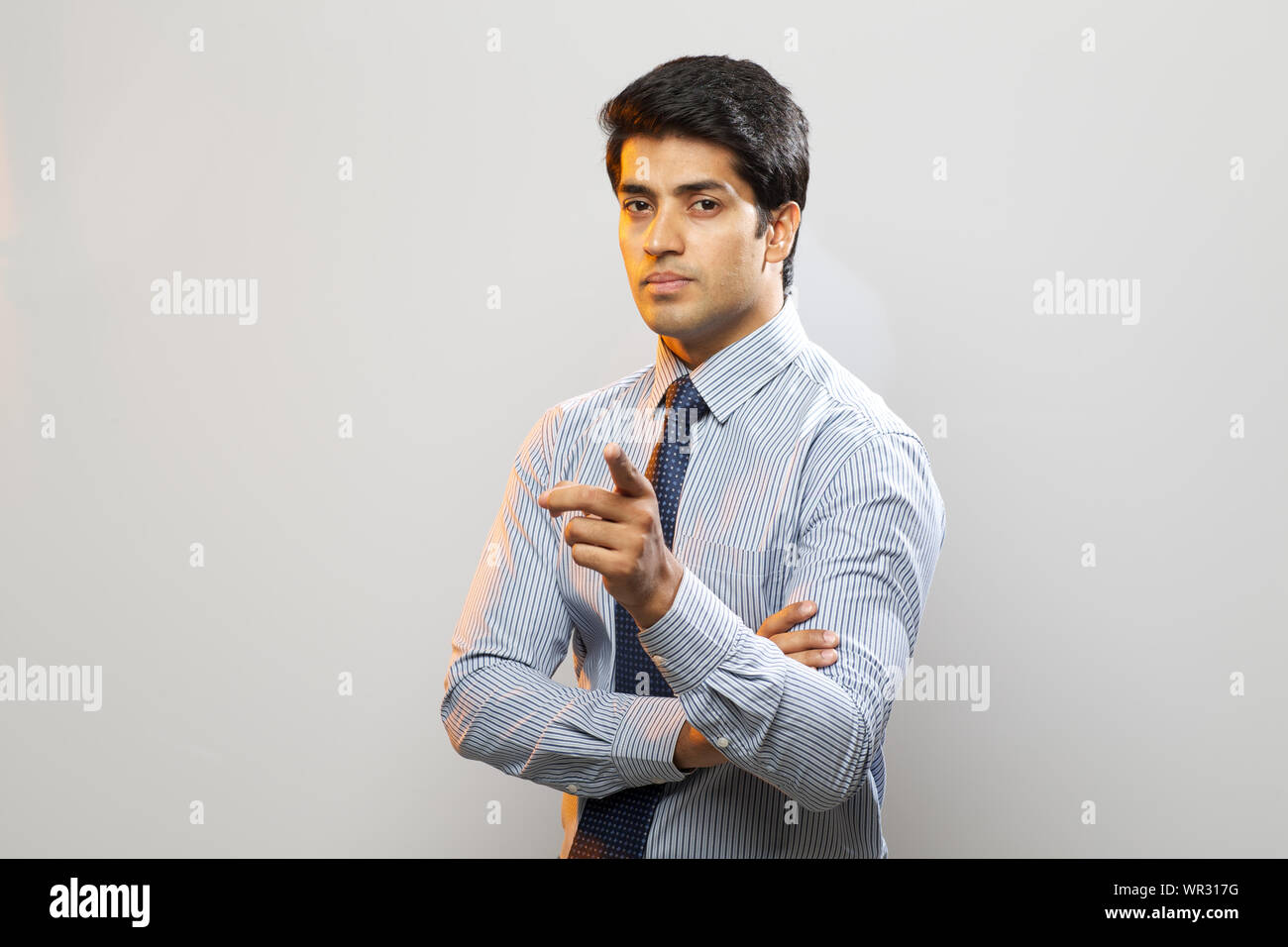 Pointing communication standing authority hi-res stock photography and ...