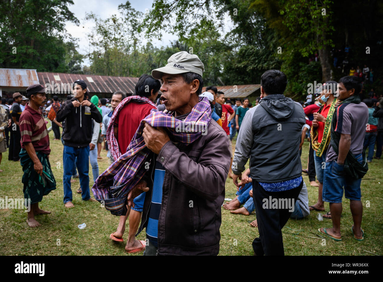 Indigenous leader chants slogans during the tradition in Toraja Utara ...