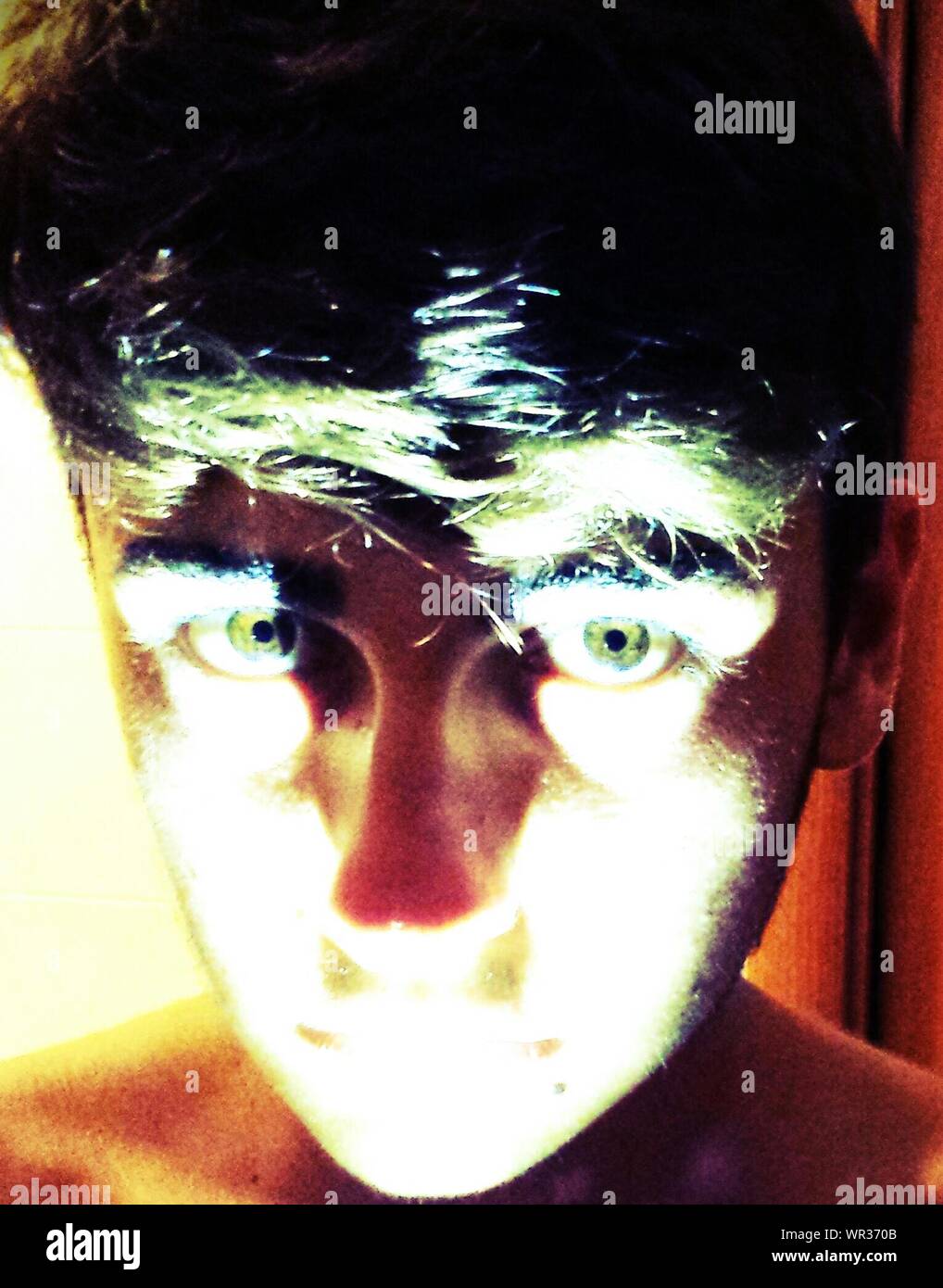 Illuminated face hi-res stock photography and images - Alamy