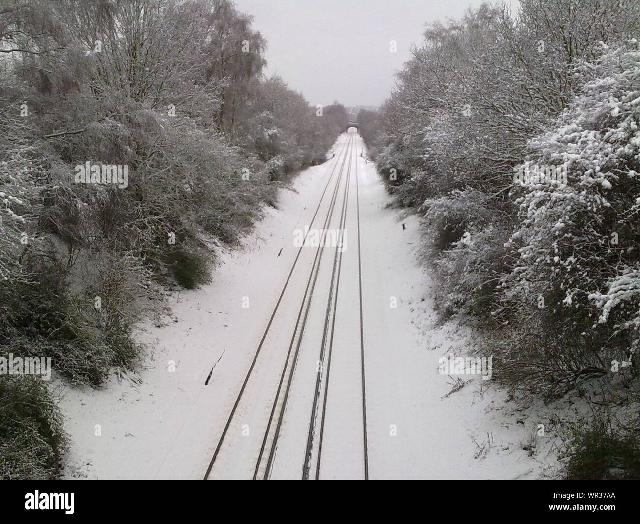 Straight railway track snow hi-res stock photography and images - Alamy