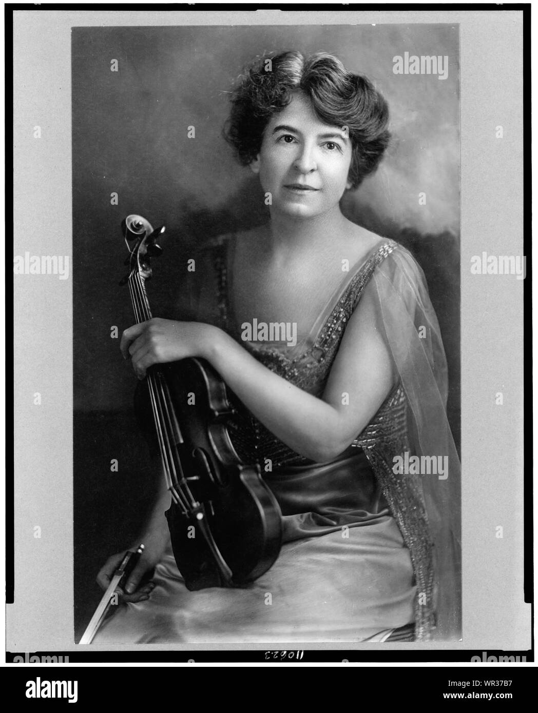 Maud Powell, three-quarter length portrait, seated, facing front ...