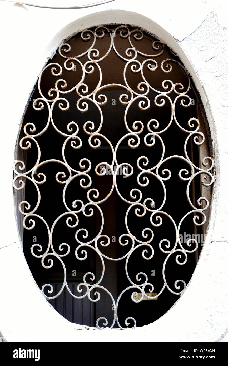 Oval wrought iron window hi-res stock photography and images - Alamy
