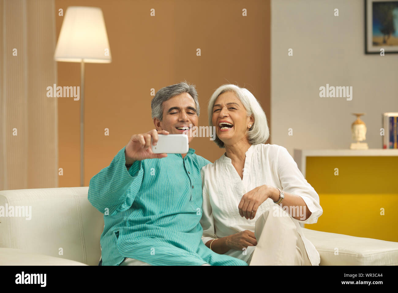 Man mobile phone close to mouth hi-res stock photography and images - Alamy