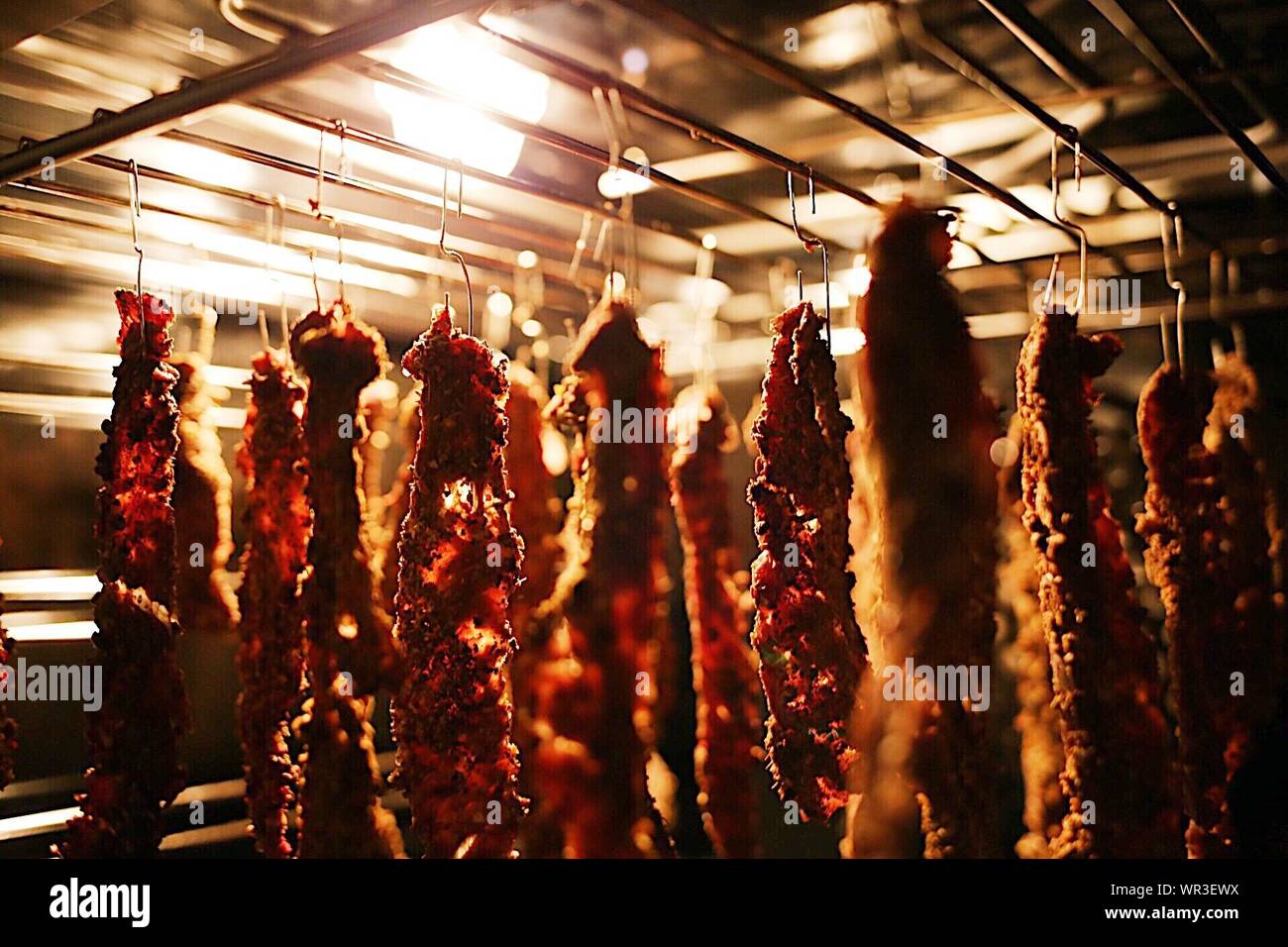 Hanging from rack hi-res stock photography and images - Alamy