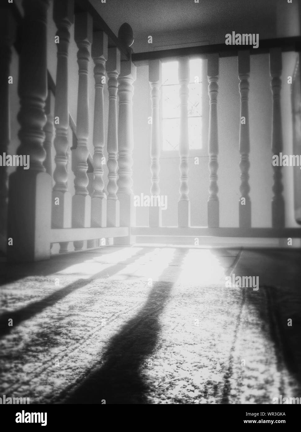 Sunlight Falling On Railing At Home Stock Photo - Alamy