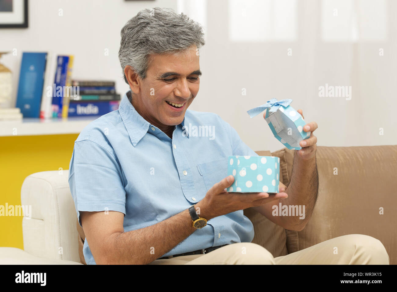 Old man surprise gift hi-res stock photography and images - Alamy