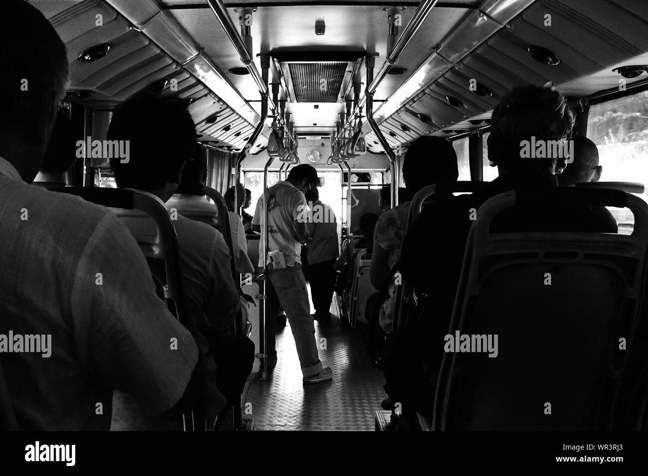 Bus passengers standing hi-res stock photography and images - Alamy