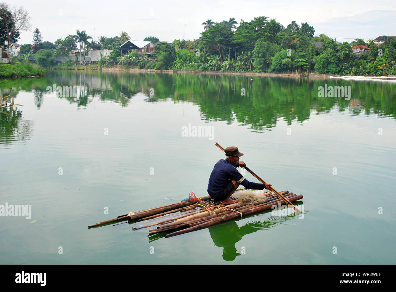 Man crouching on a raft hi-res stock photography and images - Alamy
