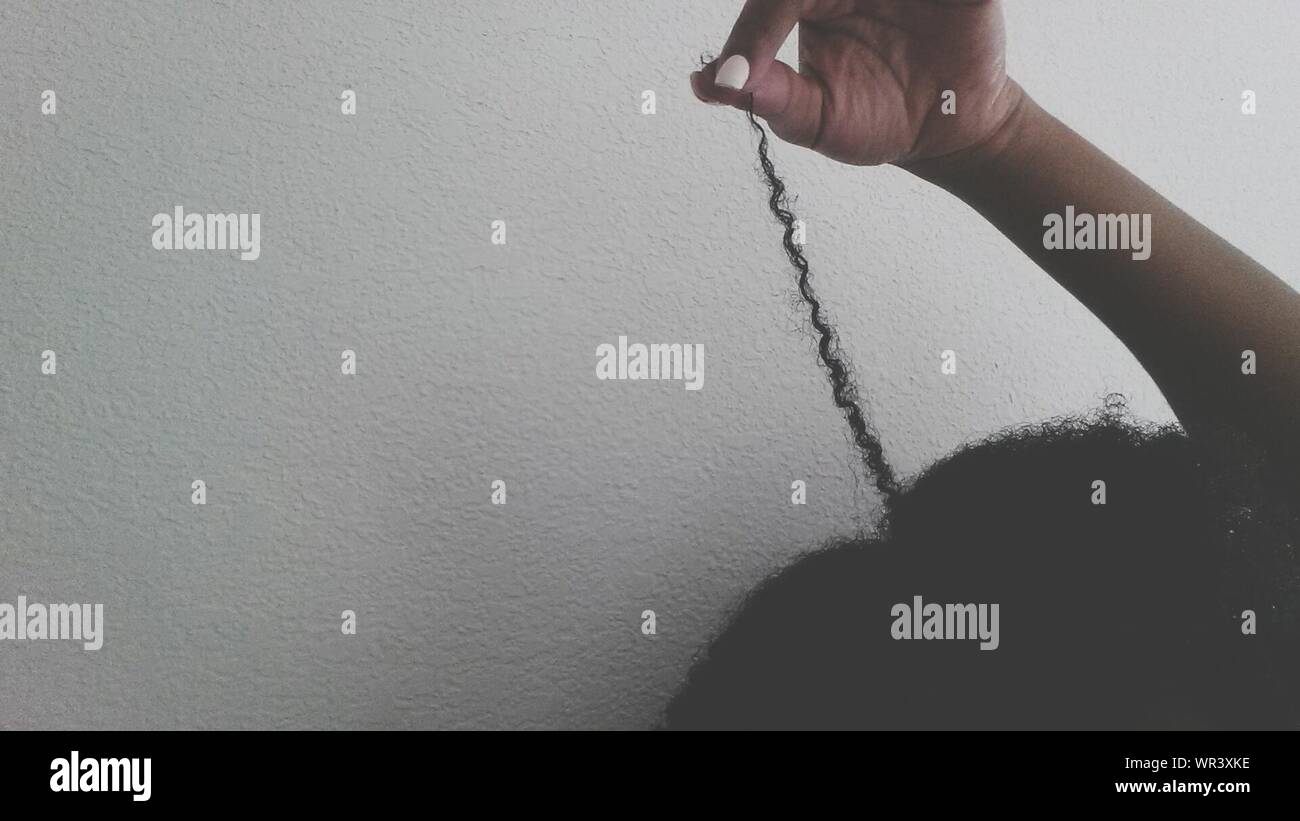 Hand pulling hair hi-res stock photography and images - Alamy