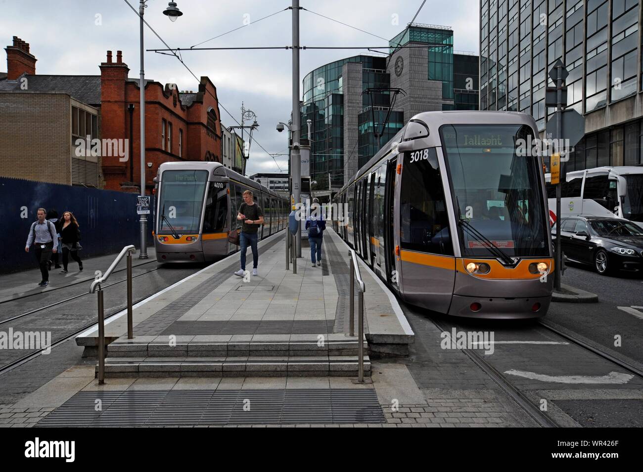 Passenegrs on the platform at Busaras tram stop on the Luas Tram ...