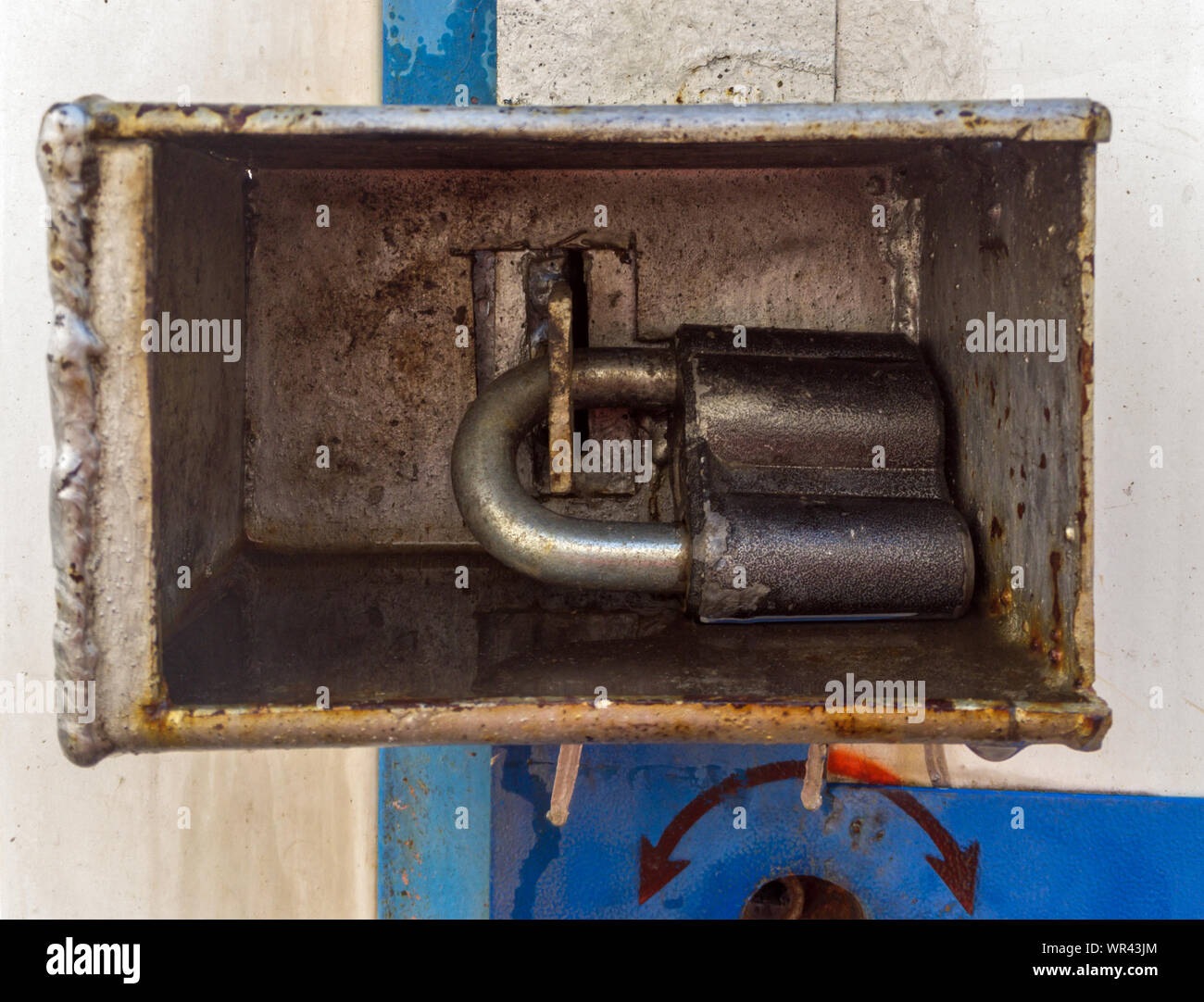 Protective device making breaking a padlock difficult Stock Photo - Alamy
