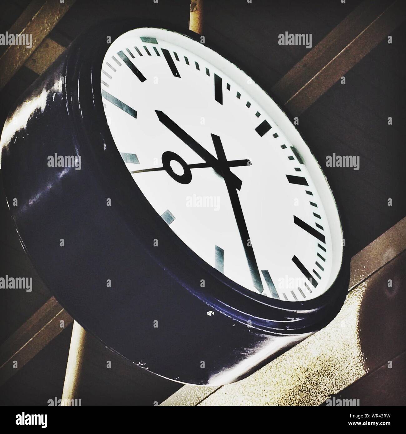 Hanging from clock hand hi-res stock photography and images - Alamy