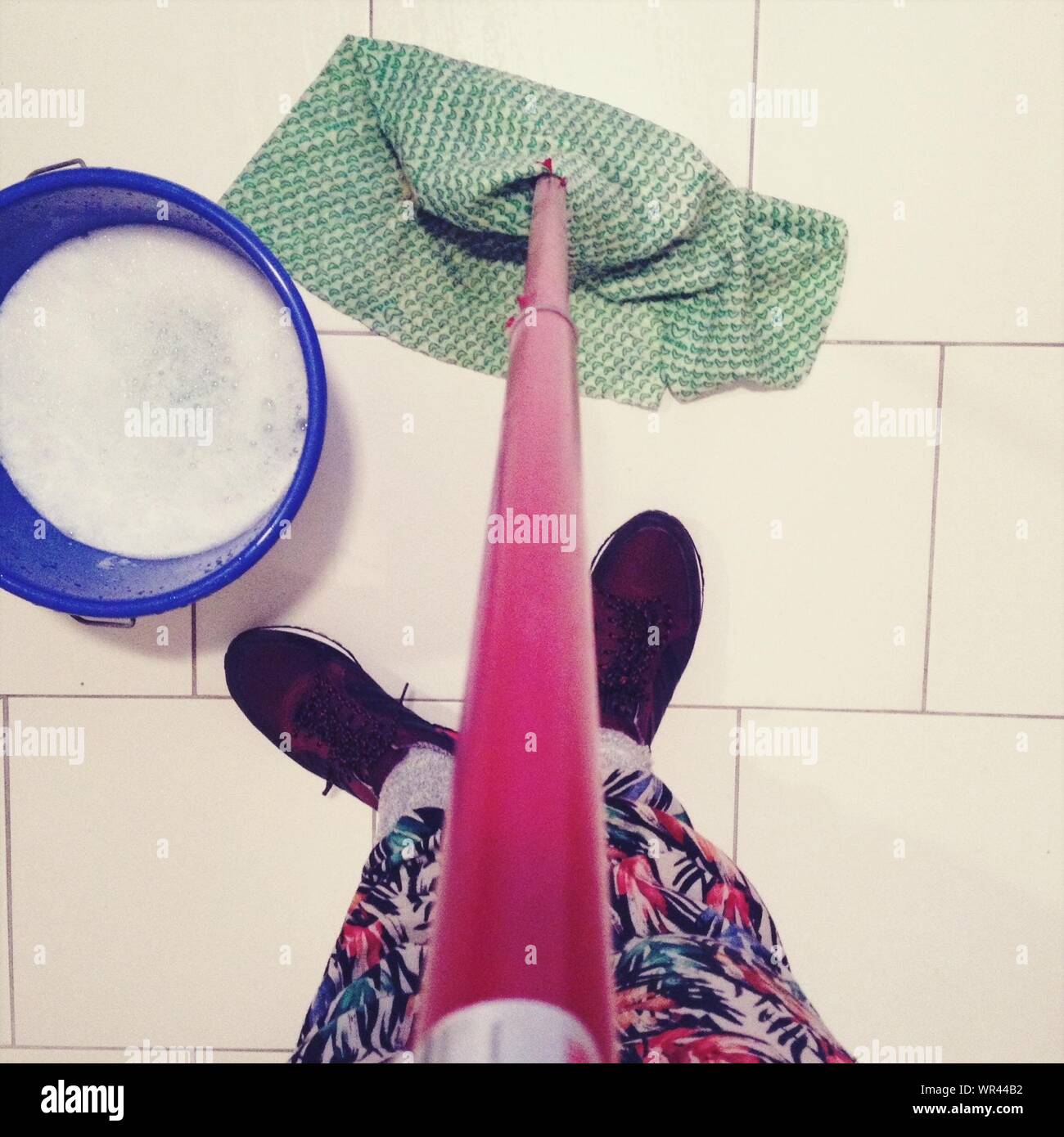 Mopping the floor hi-res stock photography and images - Alamy
