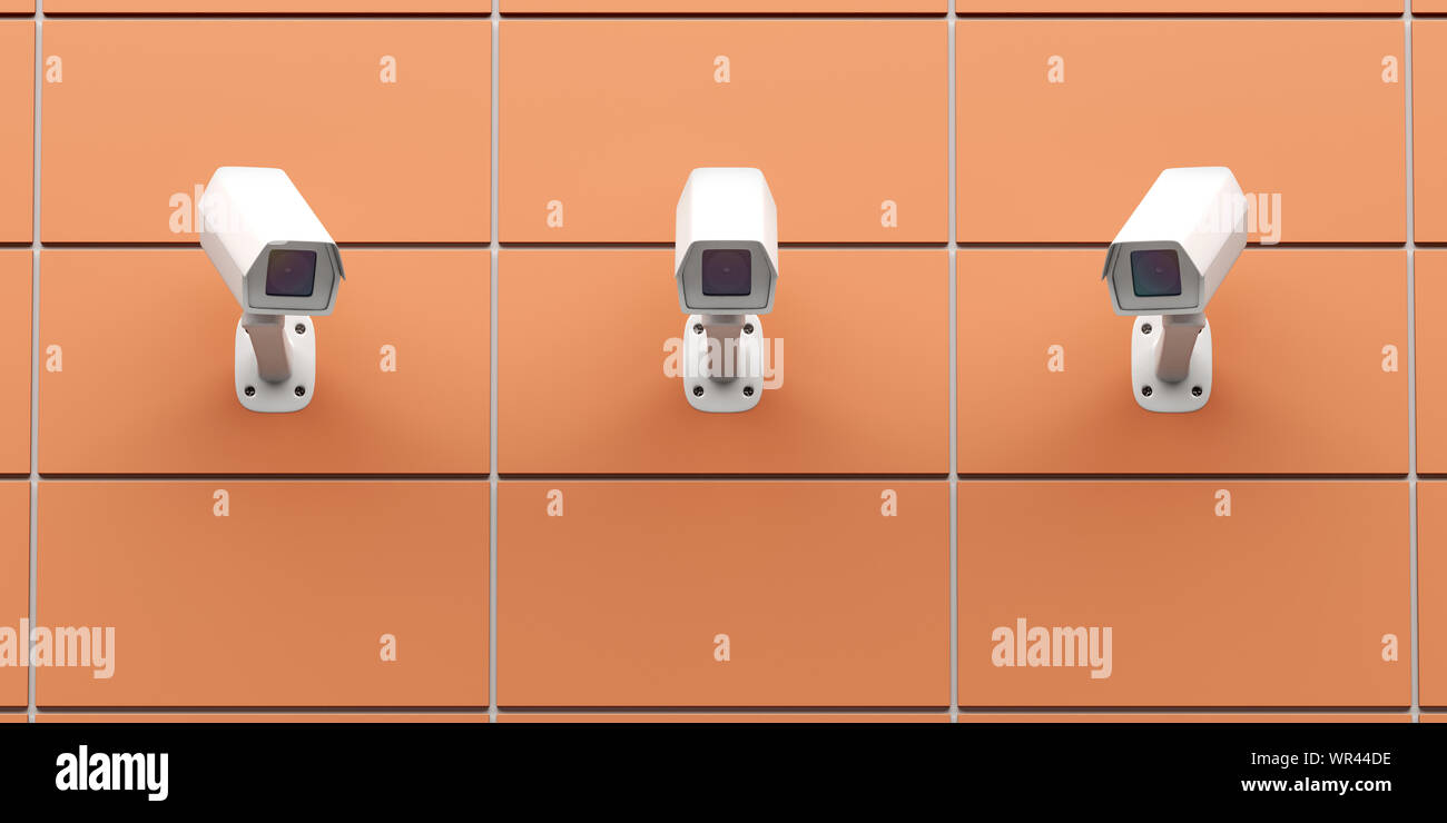 Three CCTV cameras mounted on the wall, front view Stock Photo - Alamy