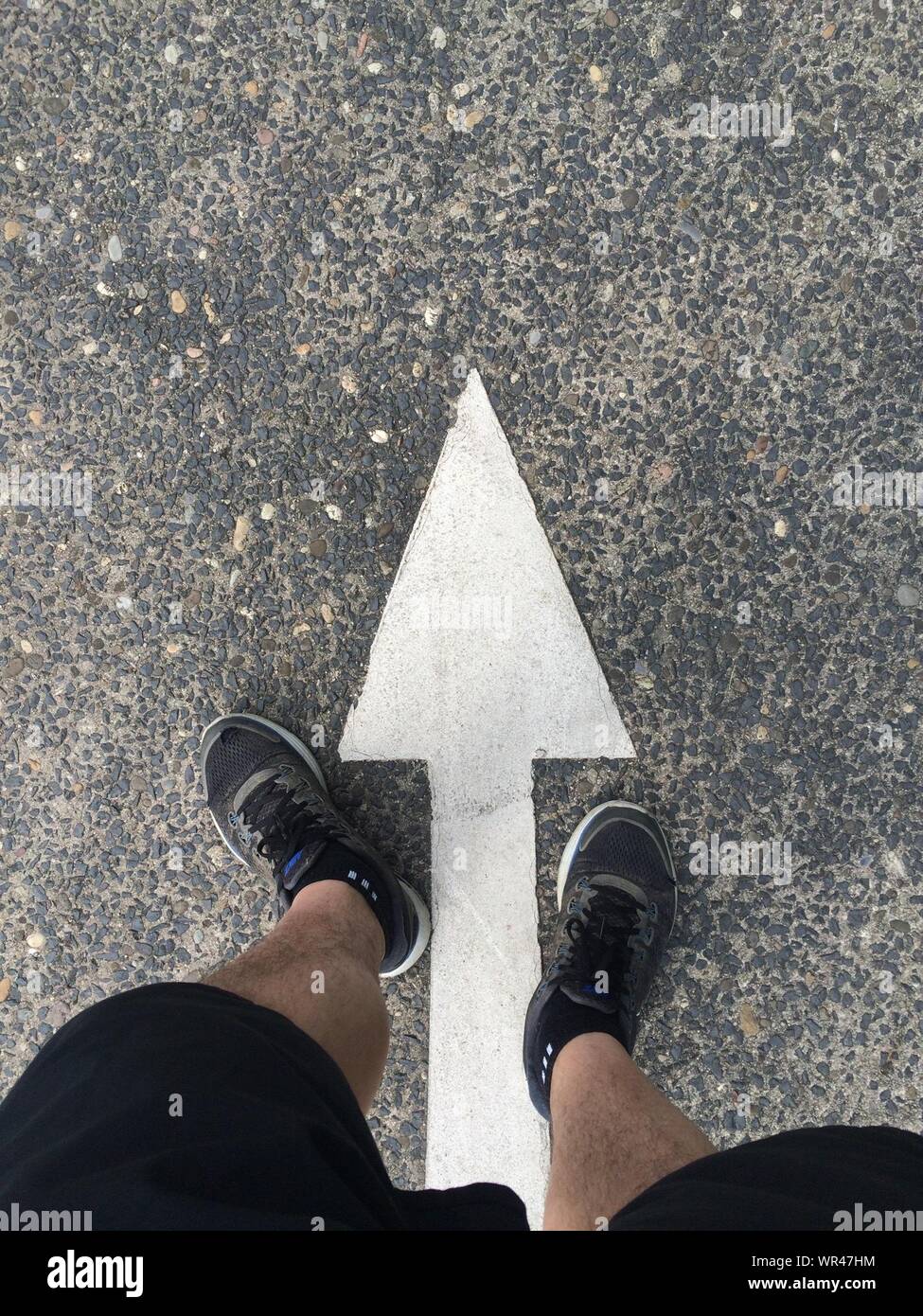 Man arrow hi-res stock photography and images - Alamy