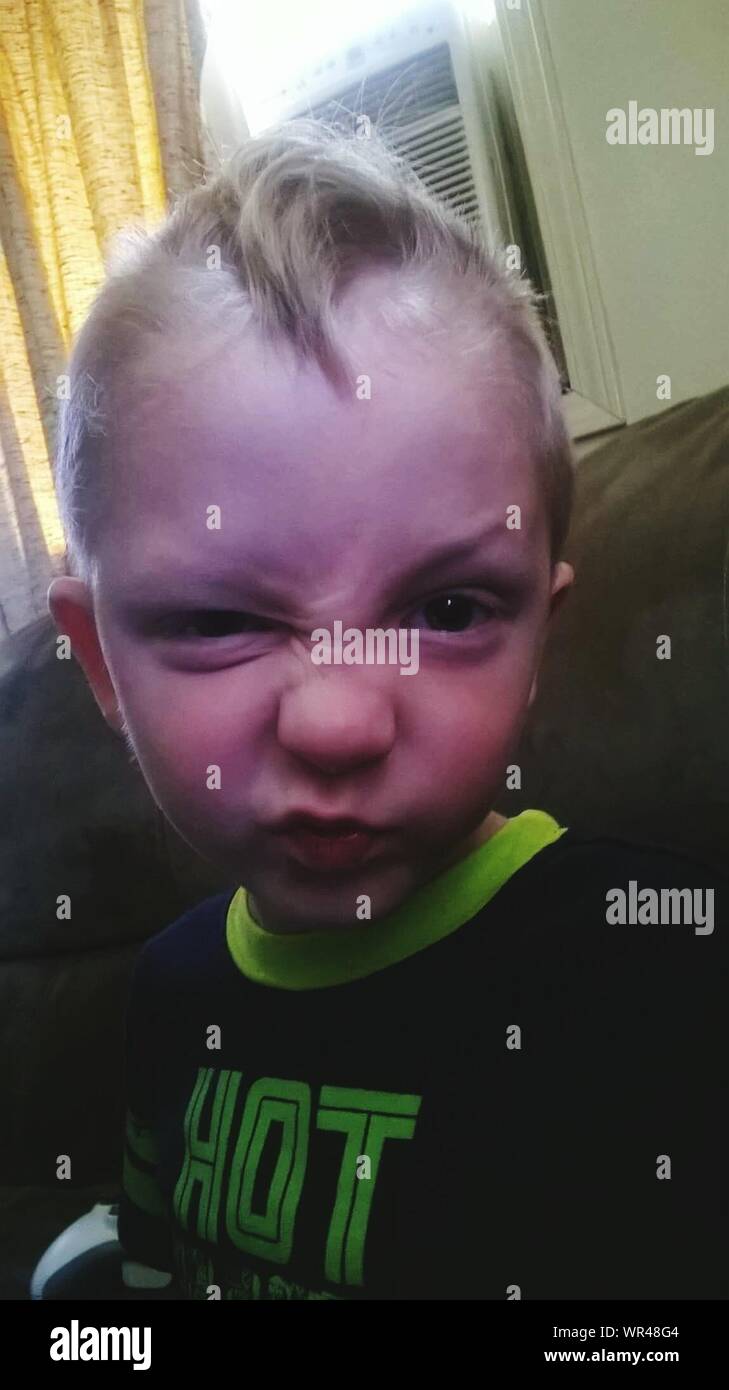 Boy making funny face hi-res stock photography and images - Alamy